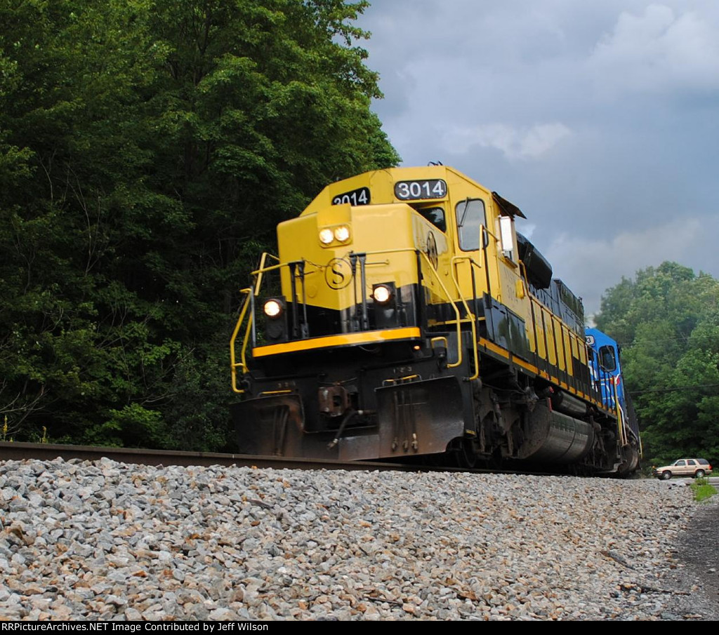 SU99 rounding the big curve